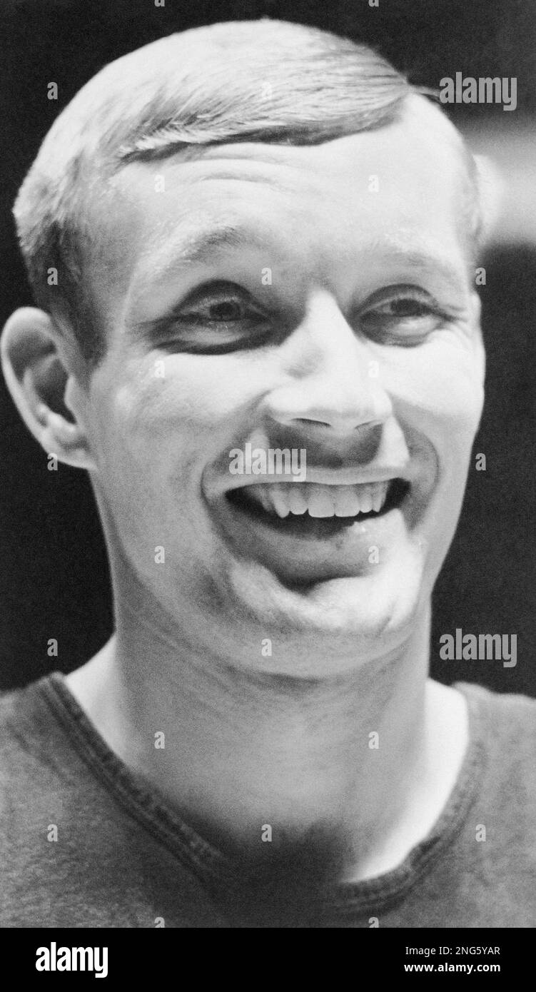 Purdue's 6'4" junior guard Rick Mount reacts upon being told that he ...