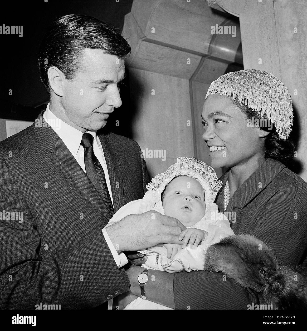 Singer Eartha Kitt poses with her eight week old daughter and her ...