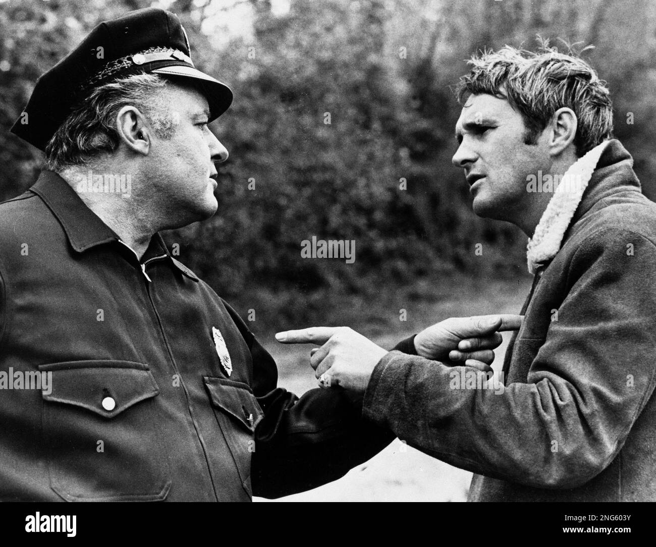 Actor Rod Steiger, left and director Norman Jewison discuss a scene ...