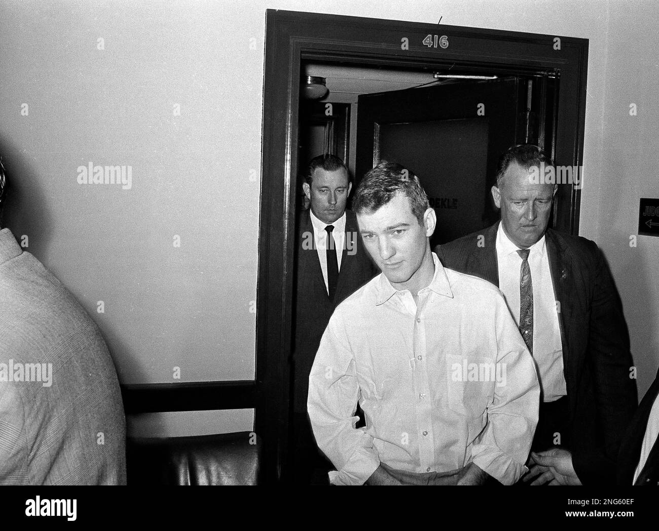 Edward Albert Seibold, 21, is escorted from the judge's chambers at ...