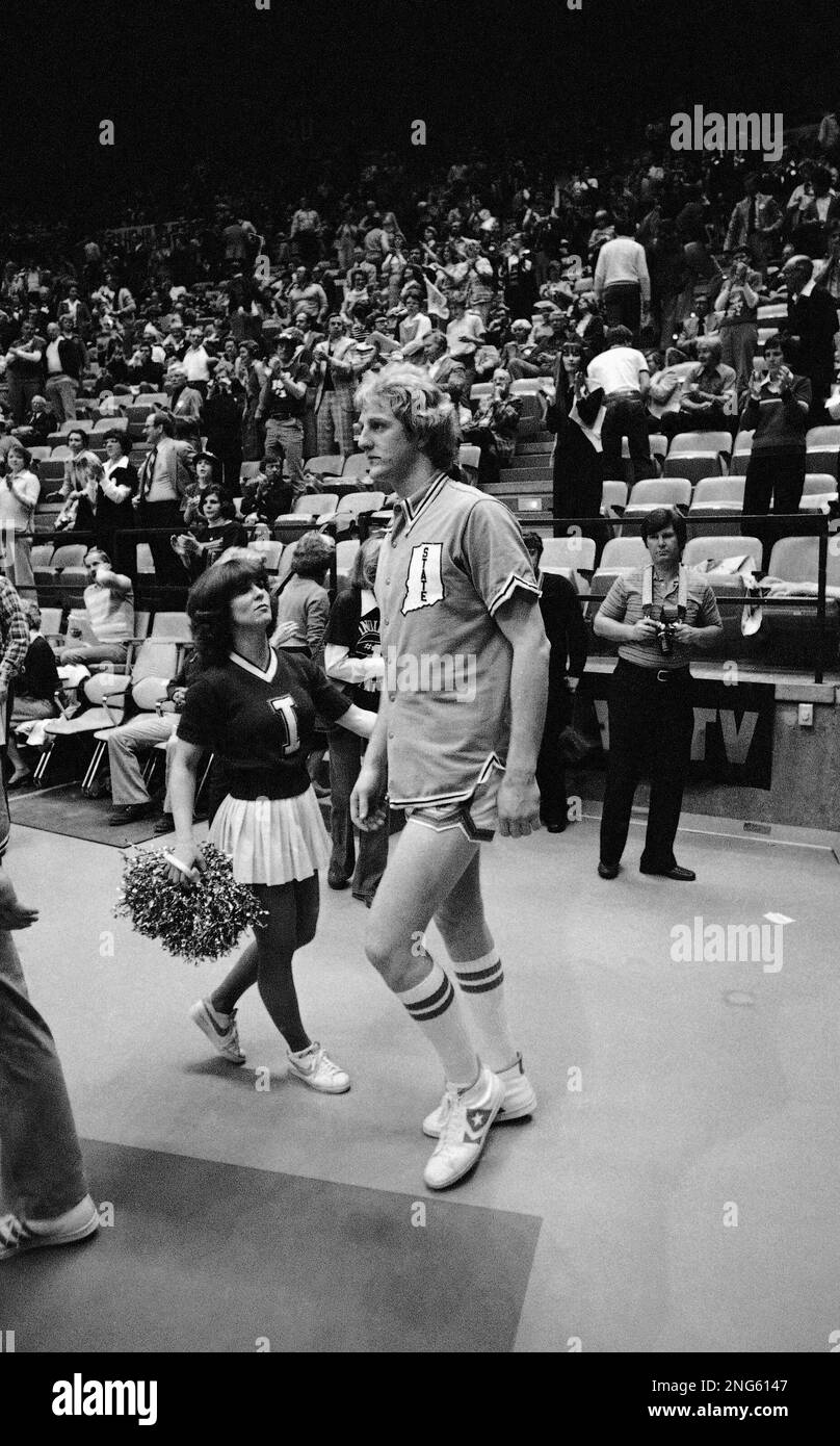 Indiana State senior cheerleader Sharon Senefeld has a look up at 6 ...