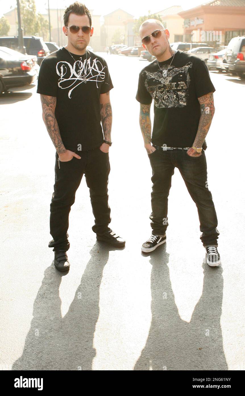 Benji Madden, right, and Joel Madden, of the band Good Charlotte, pose ...