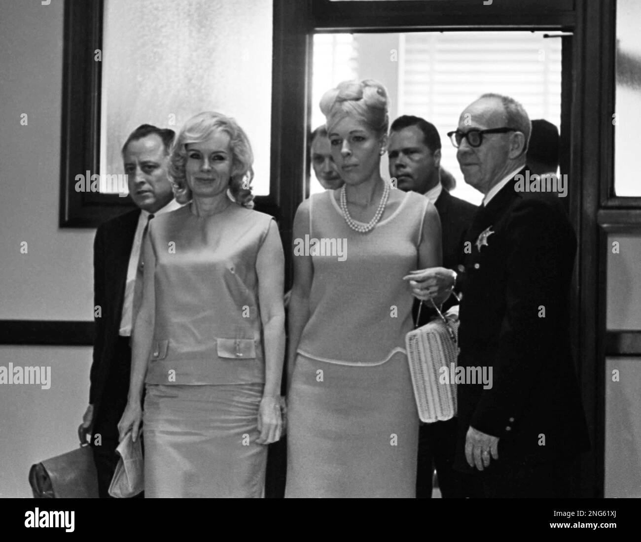 Candace Mossler, left, arrives at court in Miami, Fla., August 5, 1965 ...