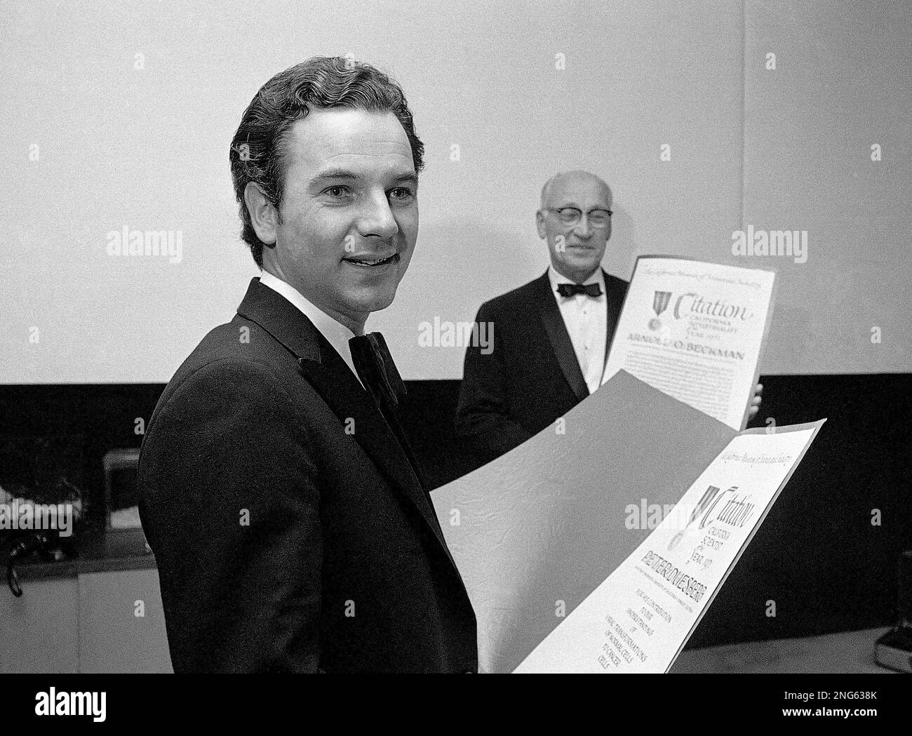 Arnold O. Beckman, right, and Peter Duesberg, are seen before the start ...