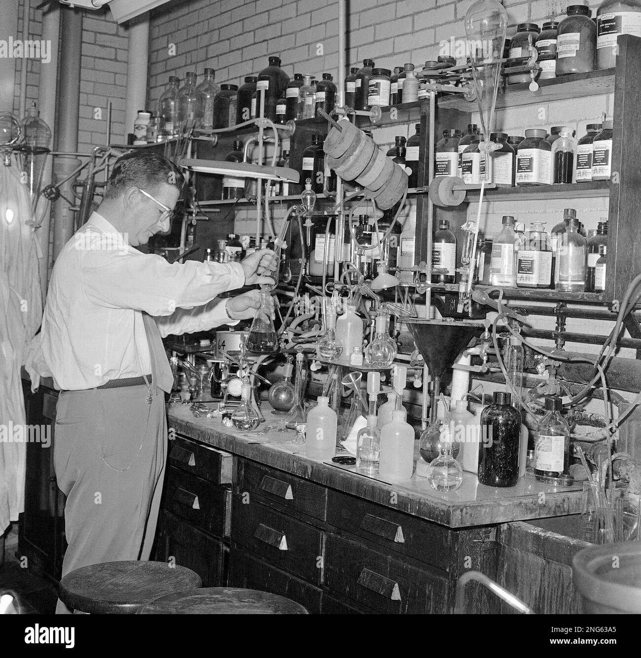 Dr. Robert B. Woodward, Harvard University chemist, working in ...