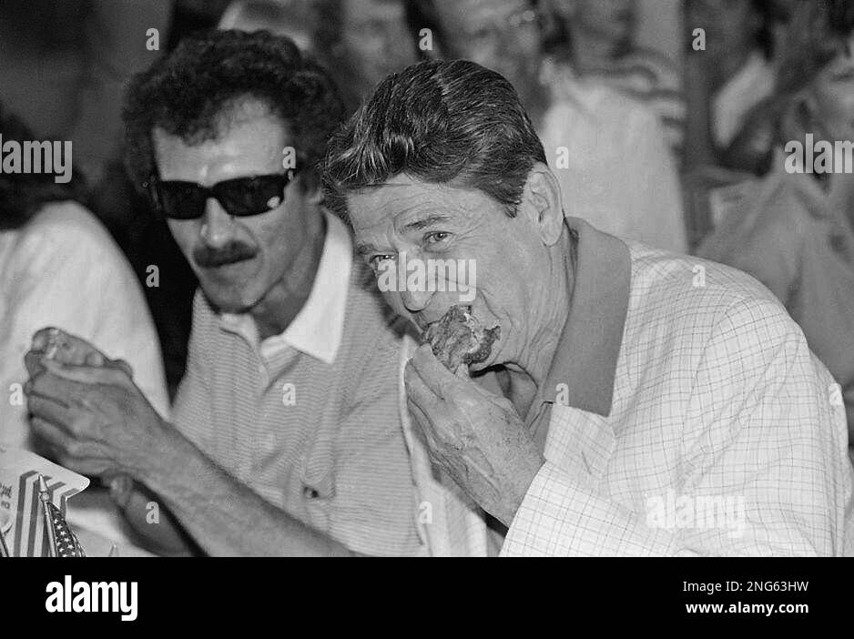 President Ronald Reagan and stock car driver Richard Petty enjoy some ...