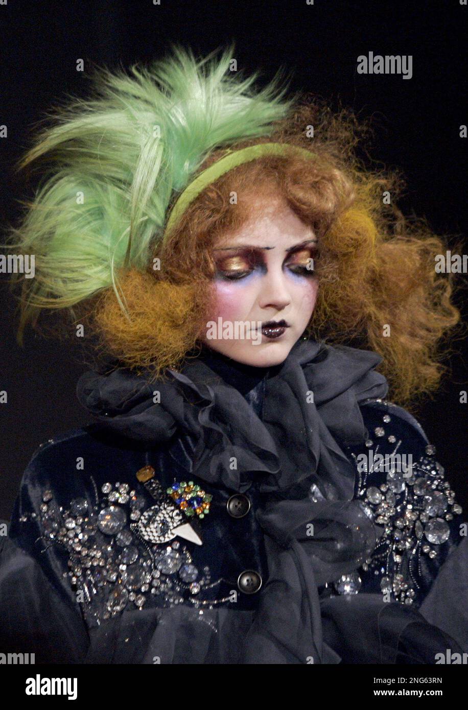 A model presents an ensemble as part of the fall-winter 2007/2008 ready ...