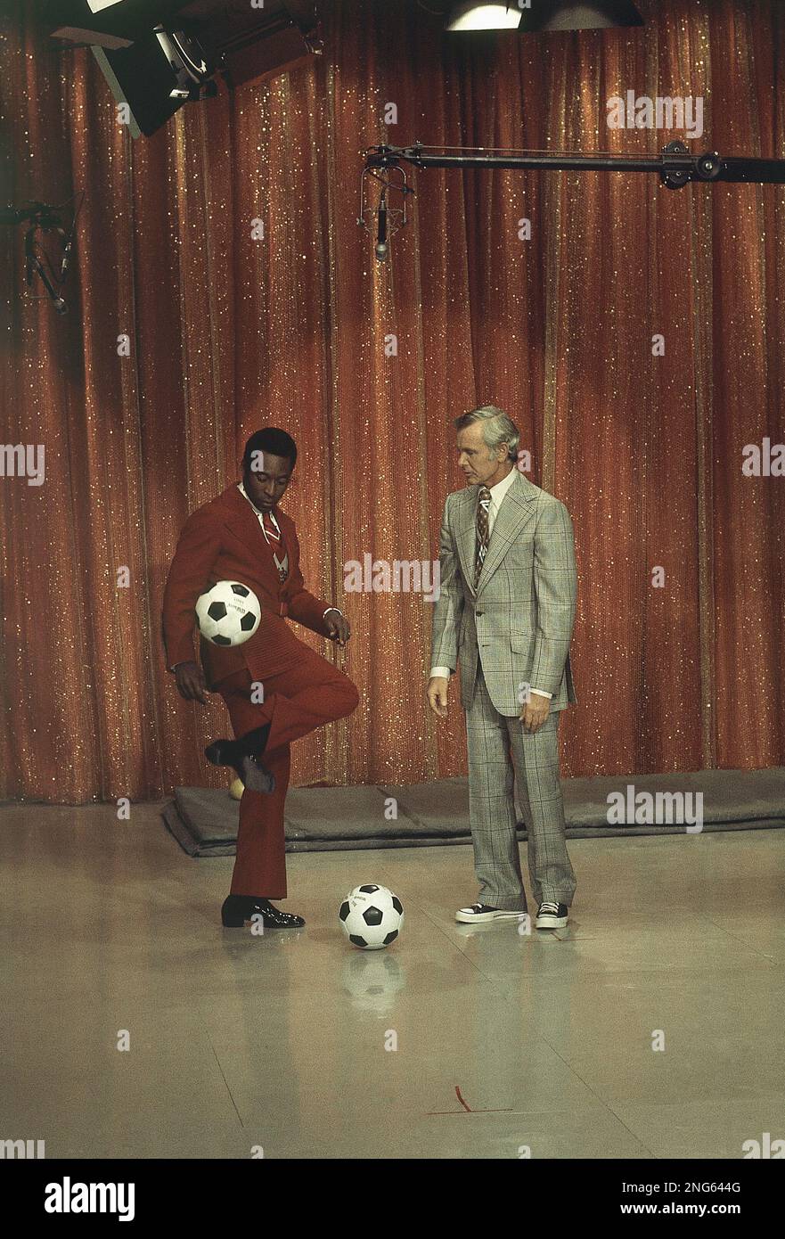 Brazilian Soccer player Pele, left, puts on a ball skills demonstration ...