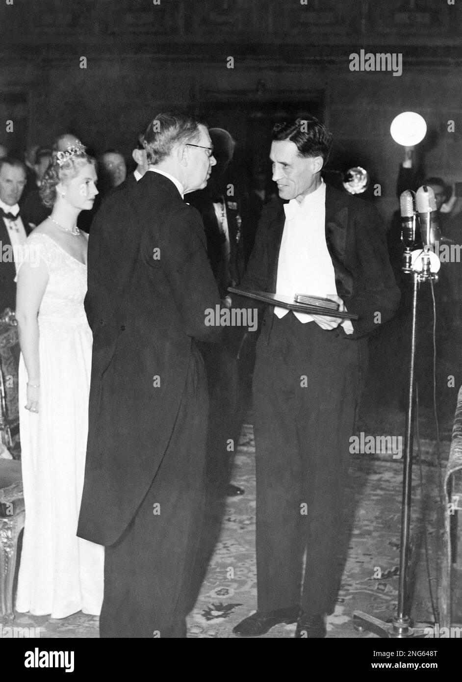 Prof. Patrick Maynard Stuart Blackett, right, receives the Nobel Prize ...