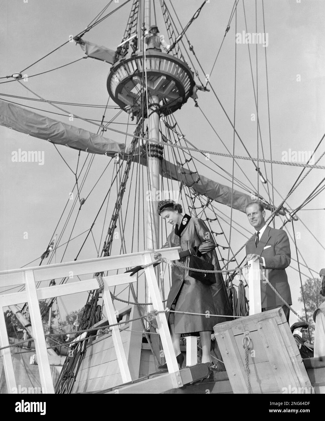 Queen Elizabeth II and Prince Philip of Great Britain leave a ship tied ...