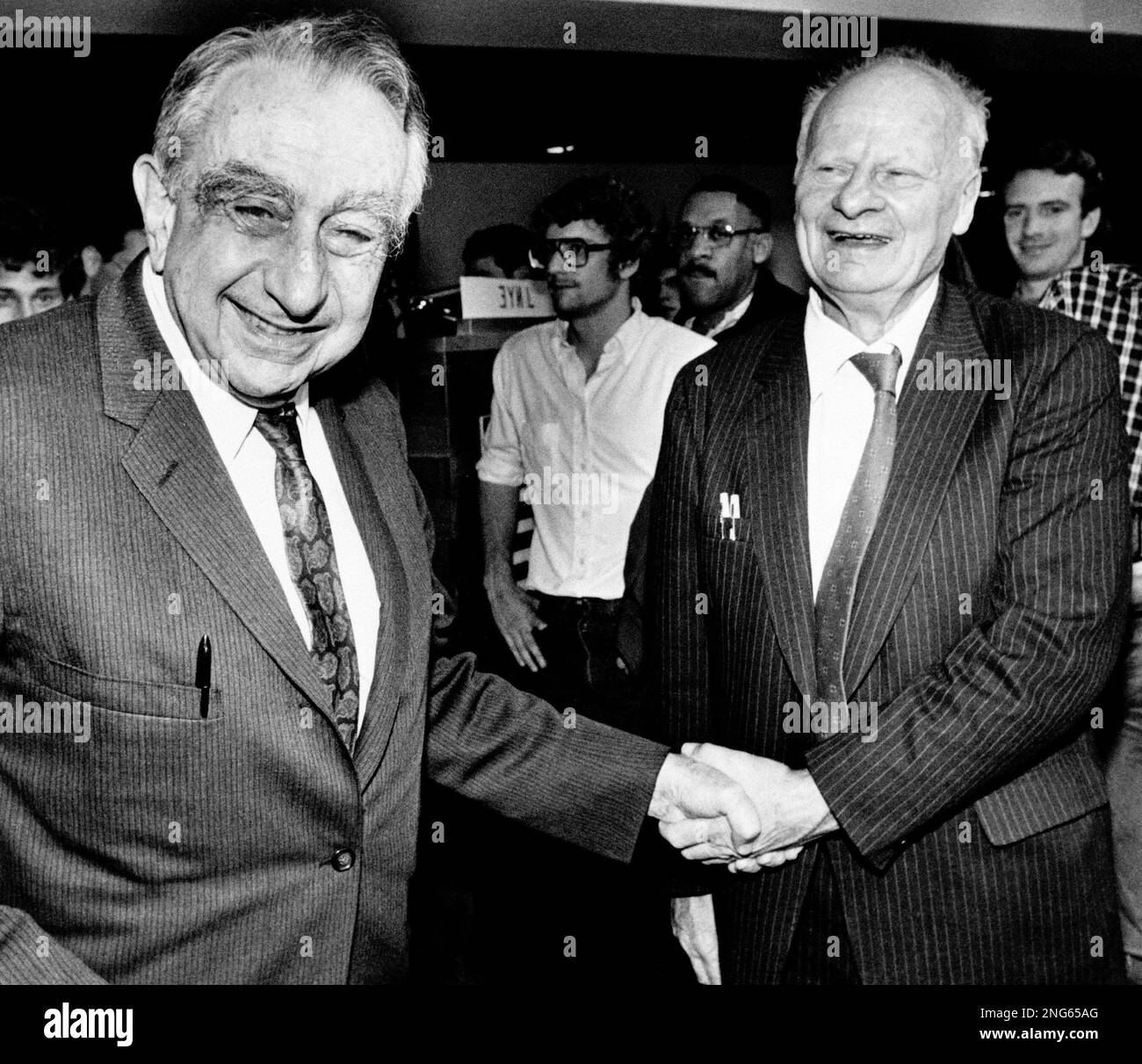 Physicist Edward Teller, right, shakes hands with Nobel Prize winner ...