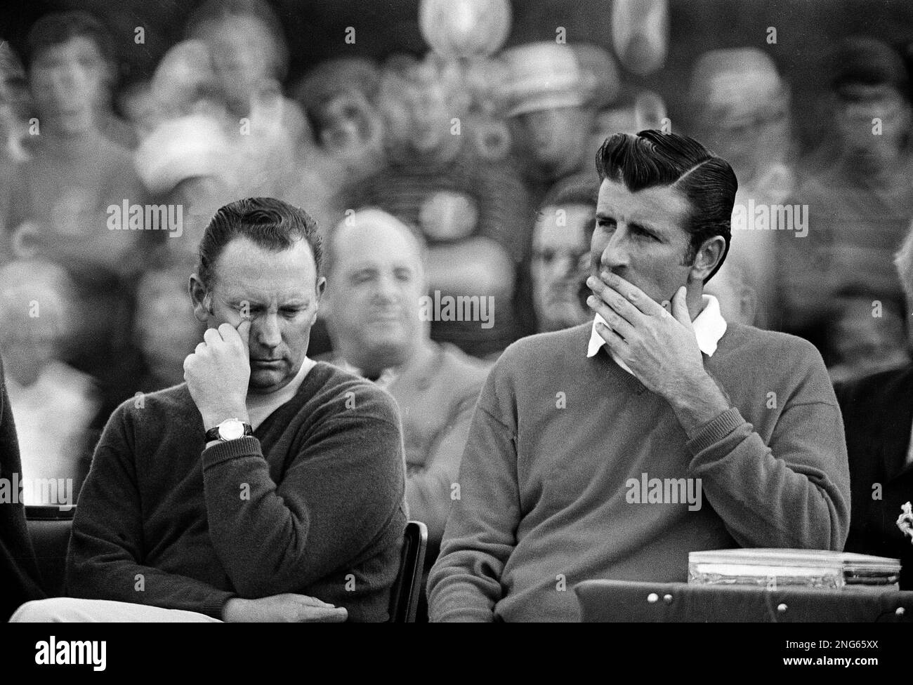 Masters winner George Archer stifles a yawn while Billy Casper, left ...