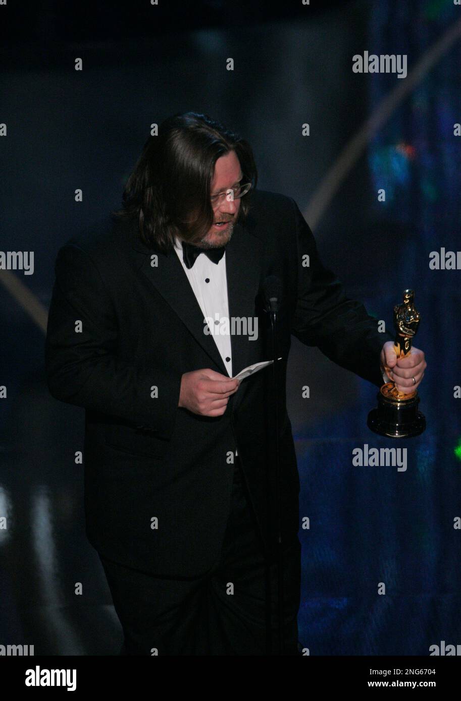 Writer William Monahan accept the Oscar for best adapted screenplay for ...