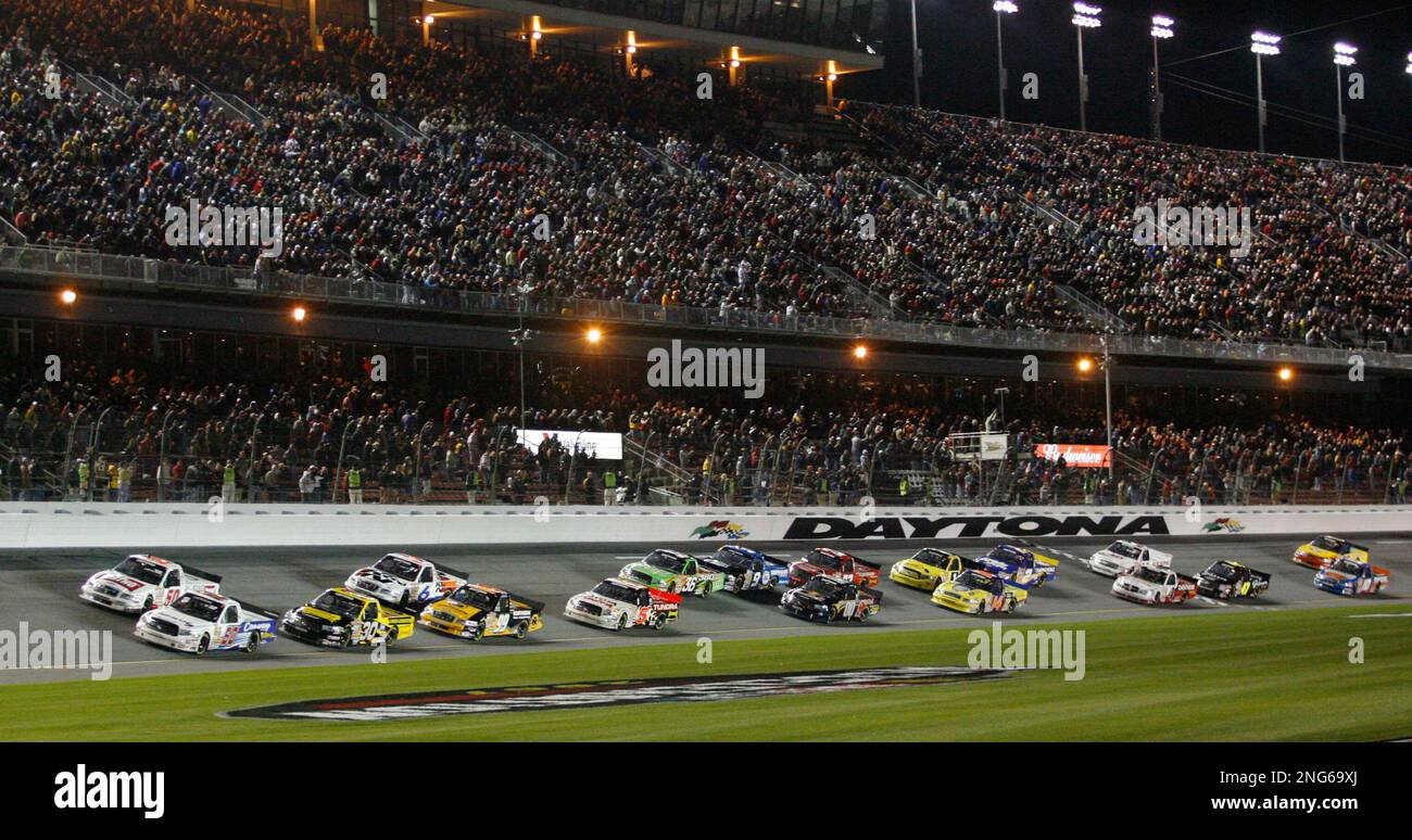 Trucks head through the tri-oval early in the NASCAR Chevy Silverado ...