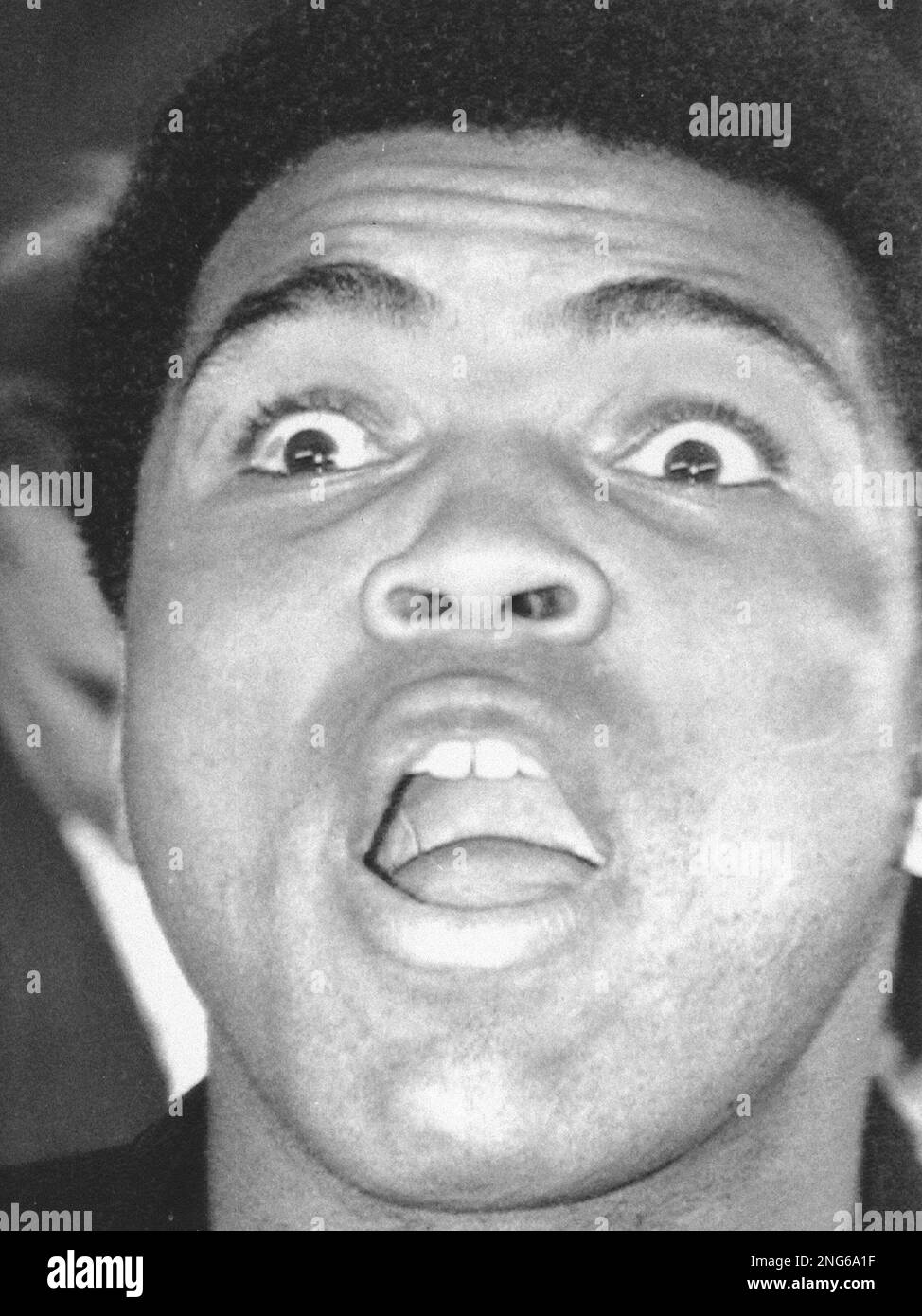 One of the many expressions on boxer Muhammad Ali's face is captured ...