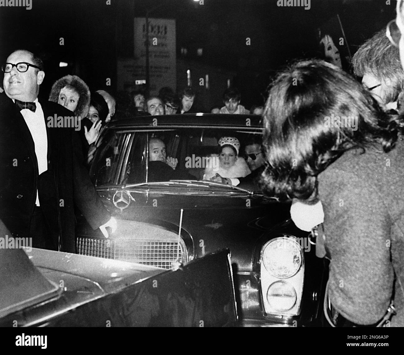 Singer-actress Barbra Streisand sits in the rear of a limousine as ...