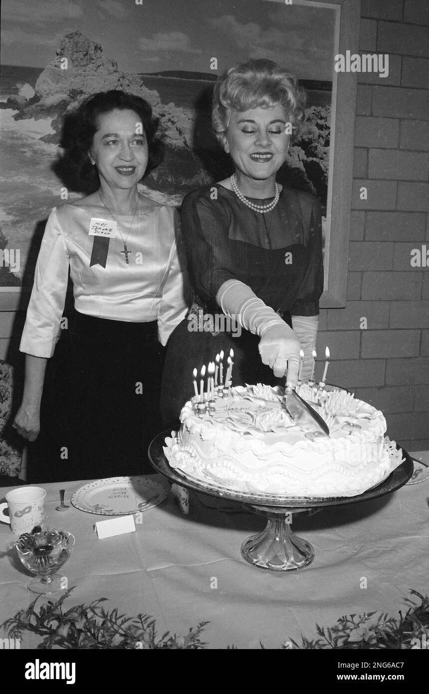 Psychic Jeane Dixon, left, is seen with singer Hildegard, cutting a ...