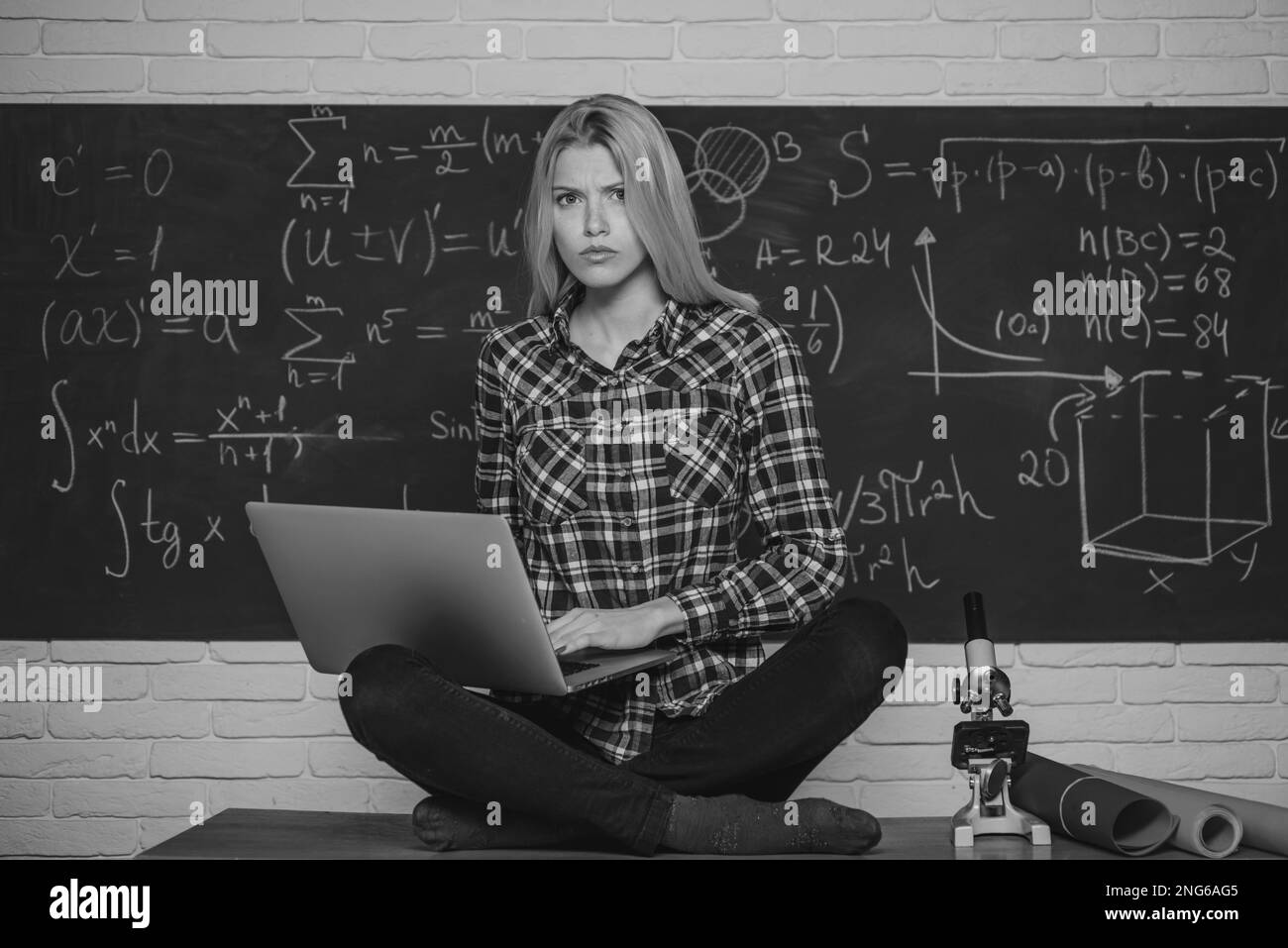 Confident in her knowledge. Portrait of college student on campus ...