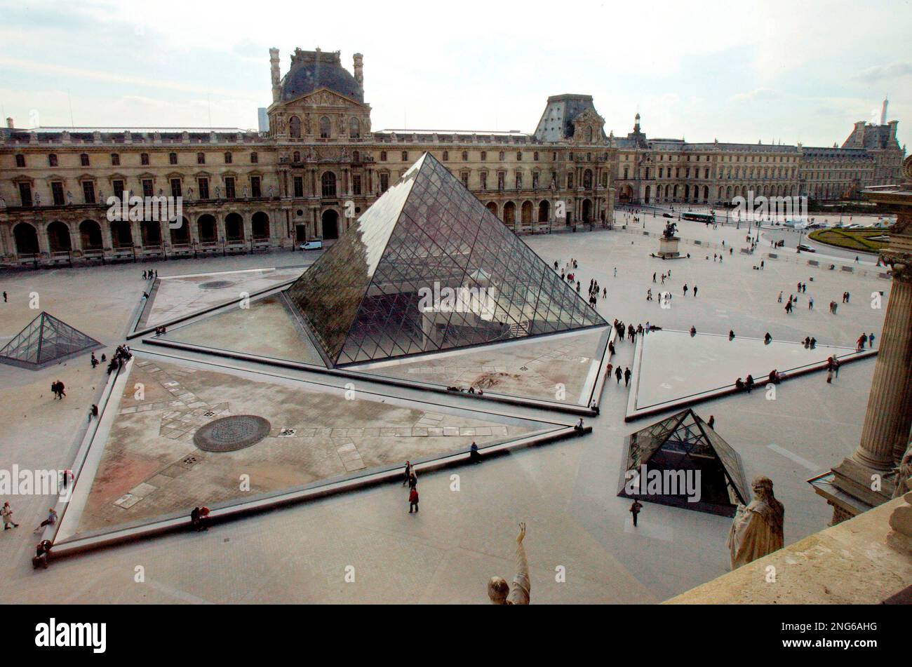 ** FILE ** A view of the Louvre's pyramid, and the southern wing of the ...