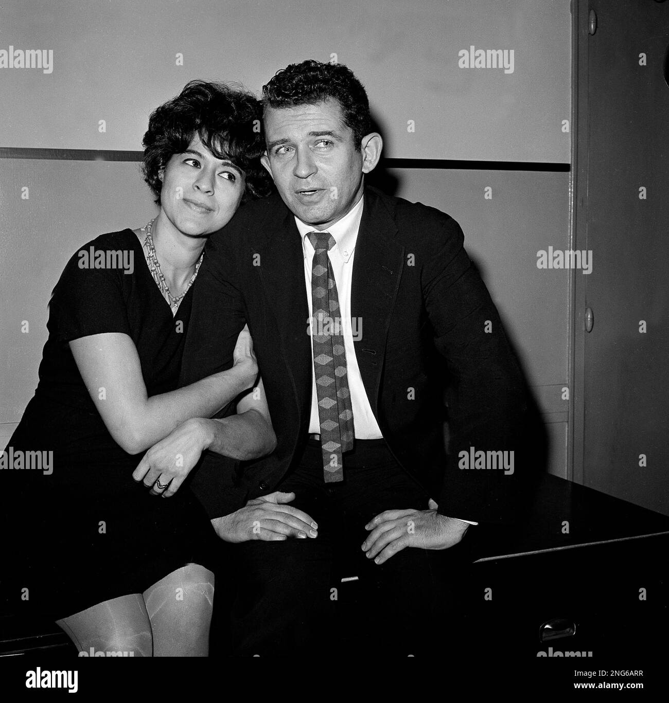 Author Norman Mailer and his second wife Adele Morales sit together in ...