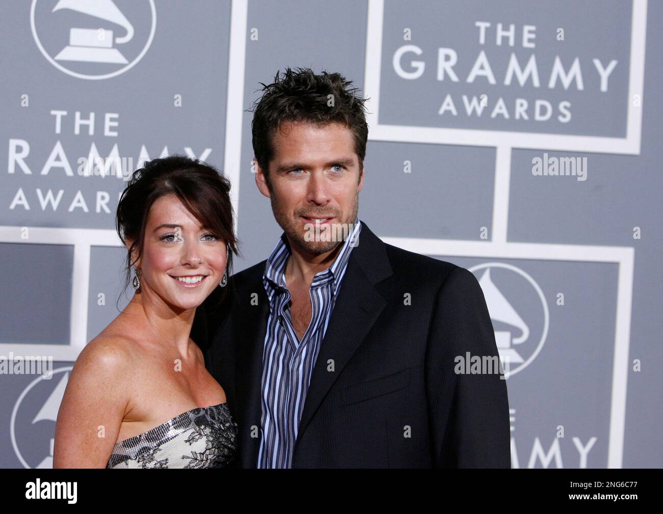 Actress Alyson Hannigan and her husband, Alexis Denisof, arrive for the 49th Annual Grammy ...