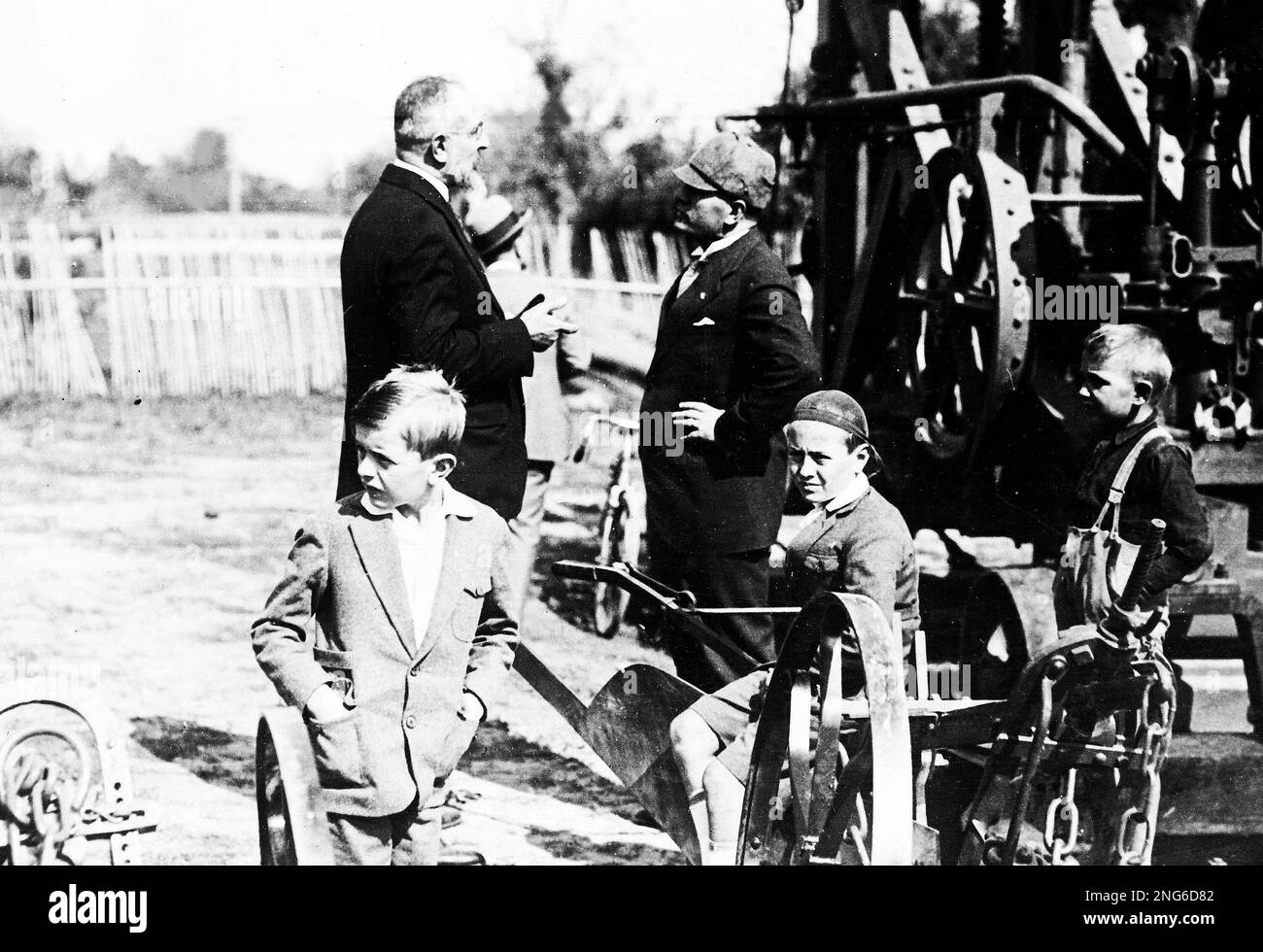 Italian Prime Minister and dictator Benito Mussolini, right, talks ...