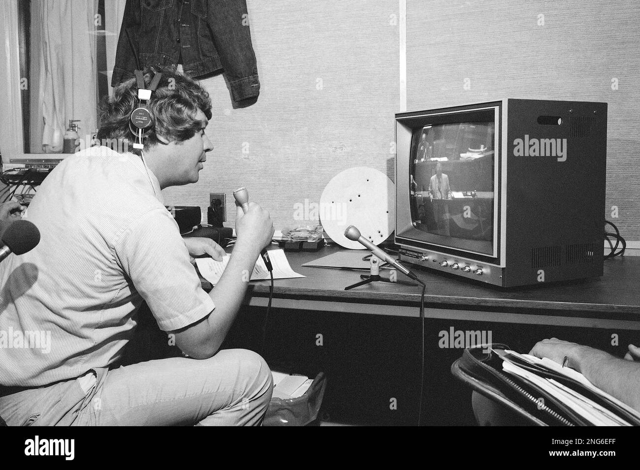 Associated Press newsman Charles Van Dyke watches a monitor at the ...