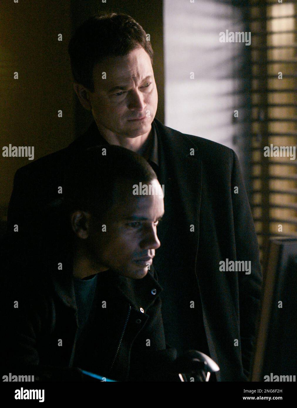 Actors Gary Sinise as Det. Mac Taylor, rear, and Hill Harper as Dr ...