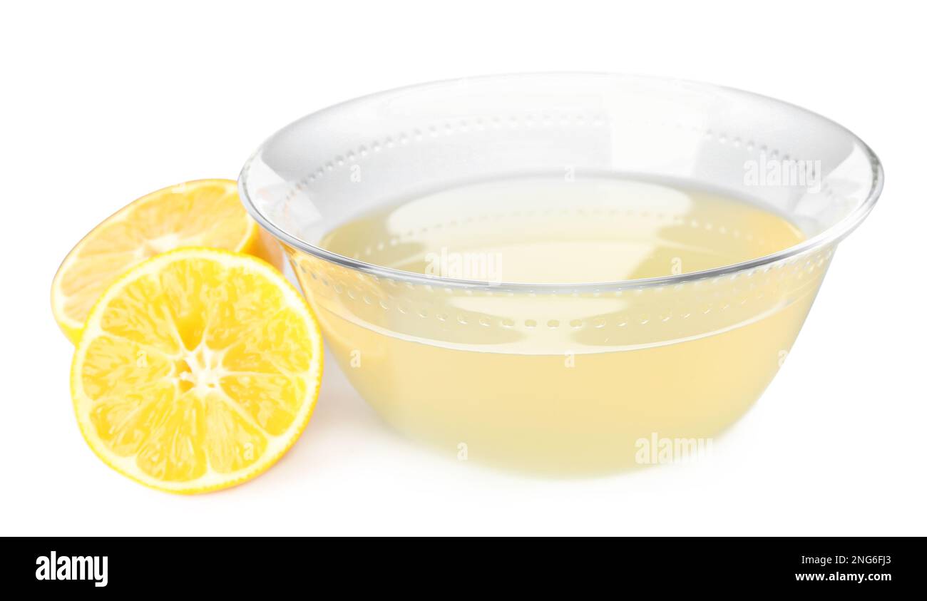 Freshly squeezed lemon juice on white background Stock Photo - Alamy