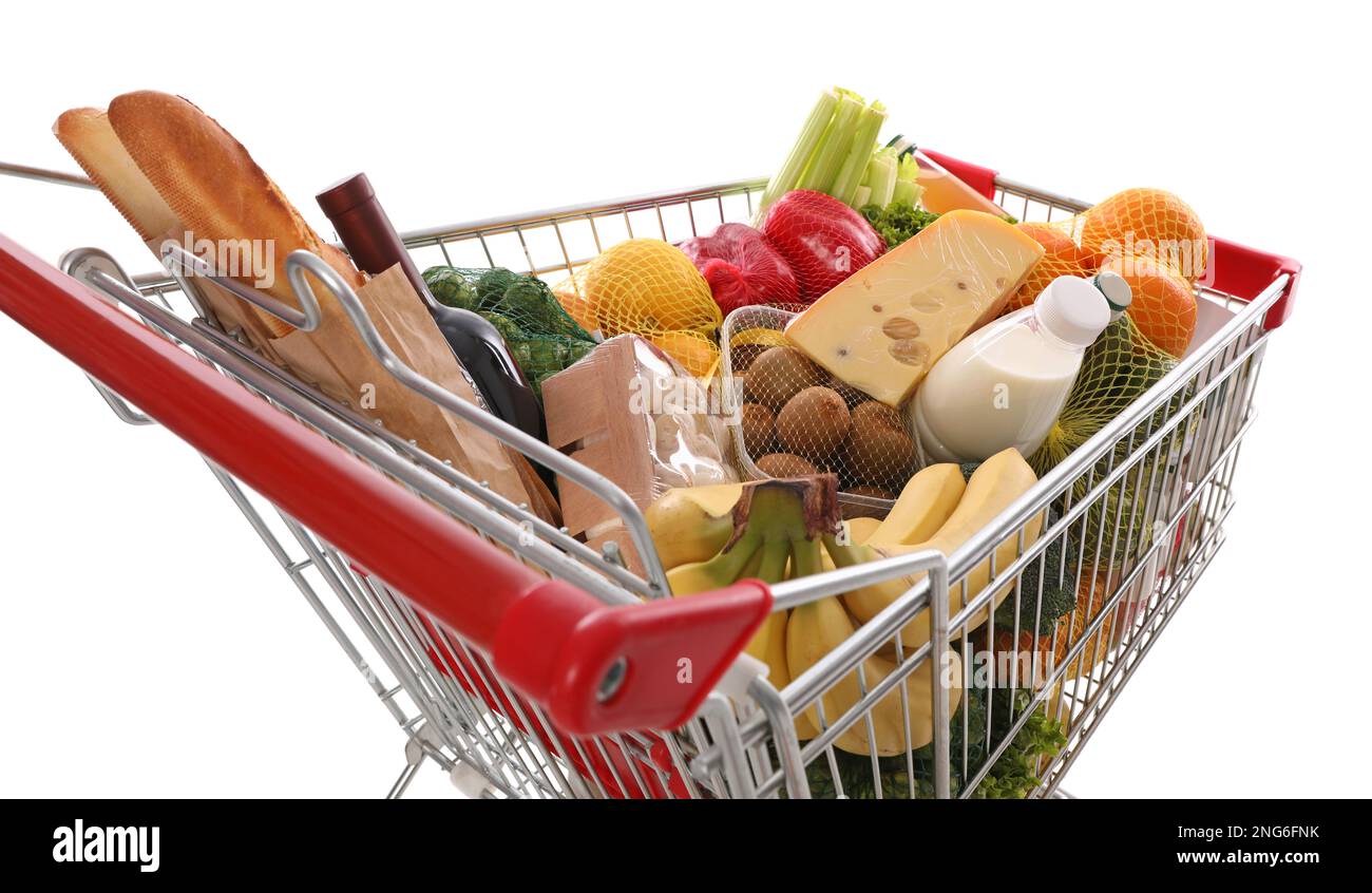 Shopping cart full of groceries on white background Stock Photo - Alamy