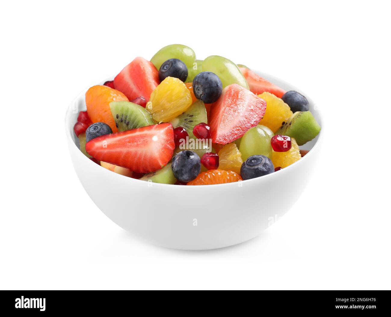 Fresh delicious fruit salad in bowl on white background Stock Photo - Alamy