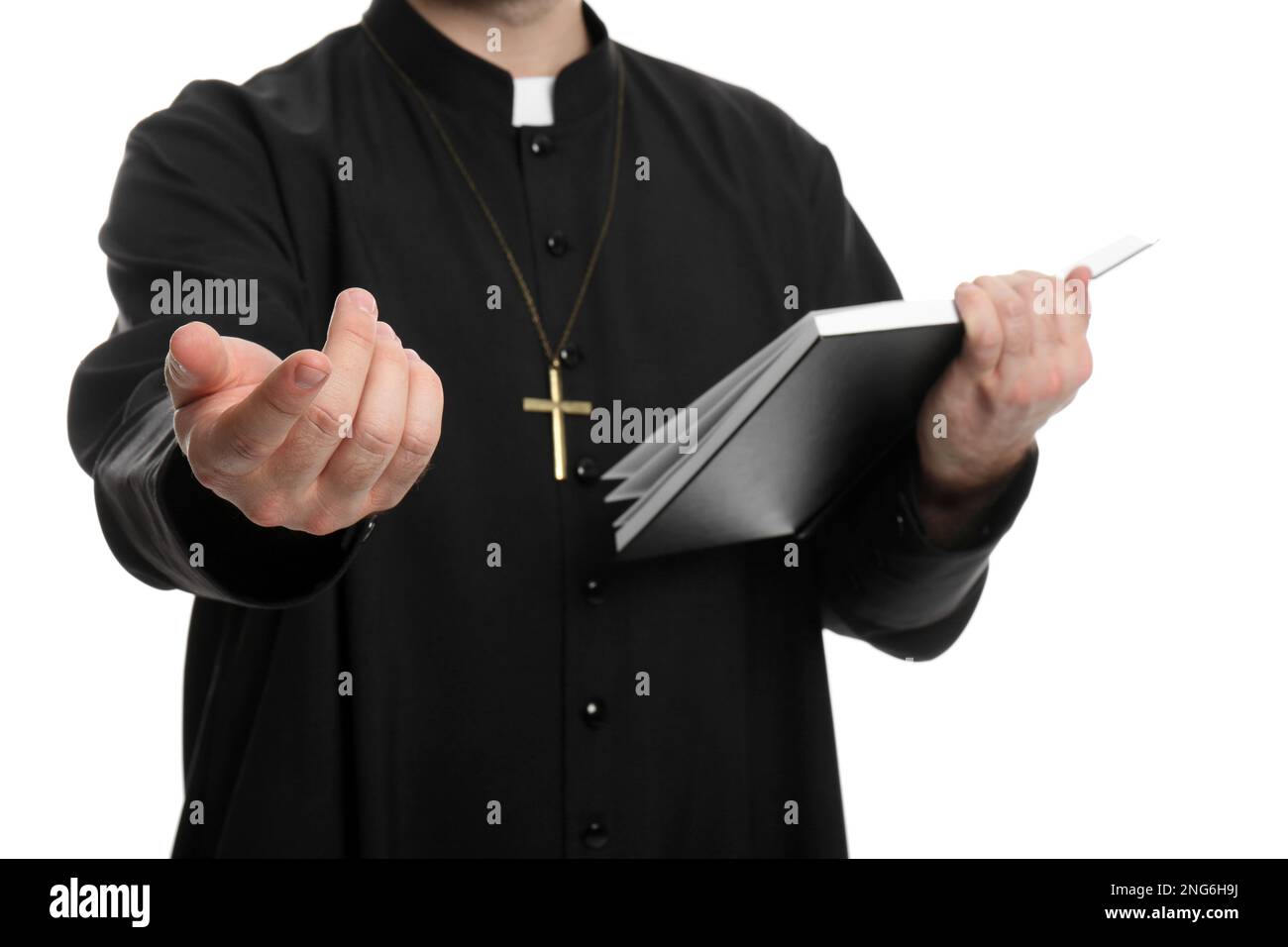 Priest with Bible praying on white background, closeup Stock Photo - Alamy