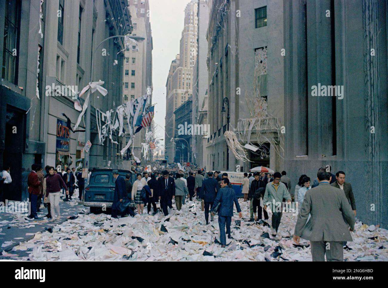 Office workers and baseball fans wade through the paper deluge in lower ...
