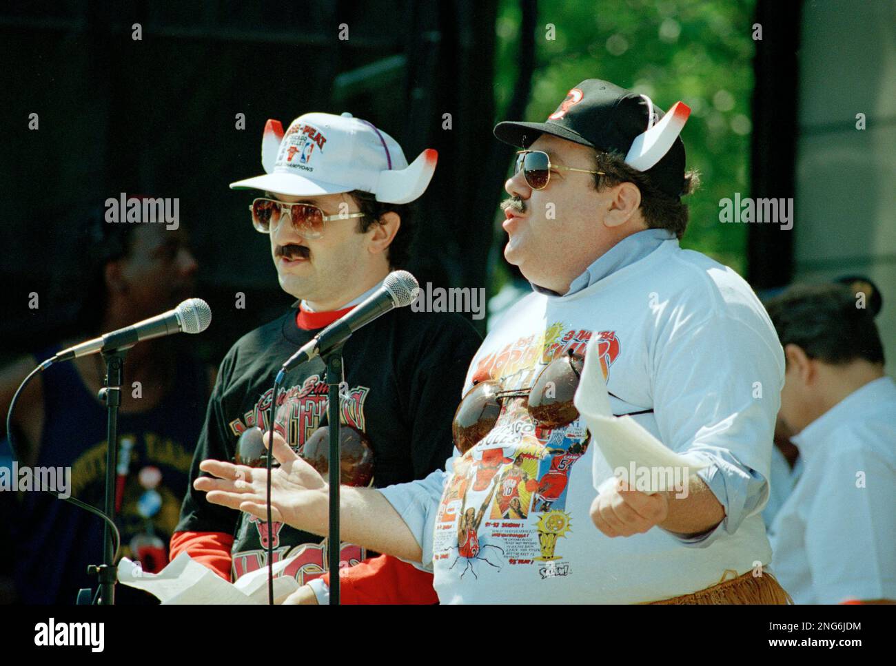 Chicago Bulls "SuperFans" Robert Smigel and George Wendt, at right, join in the rally for the ...
