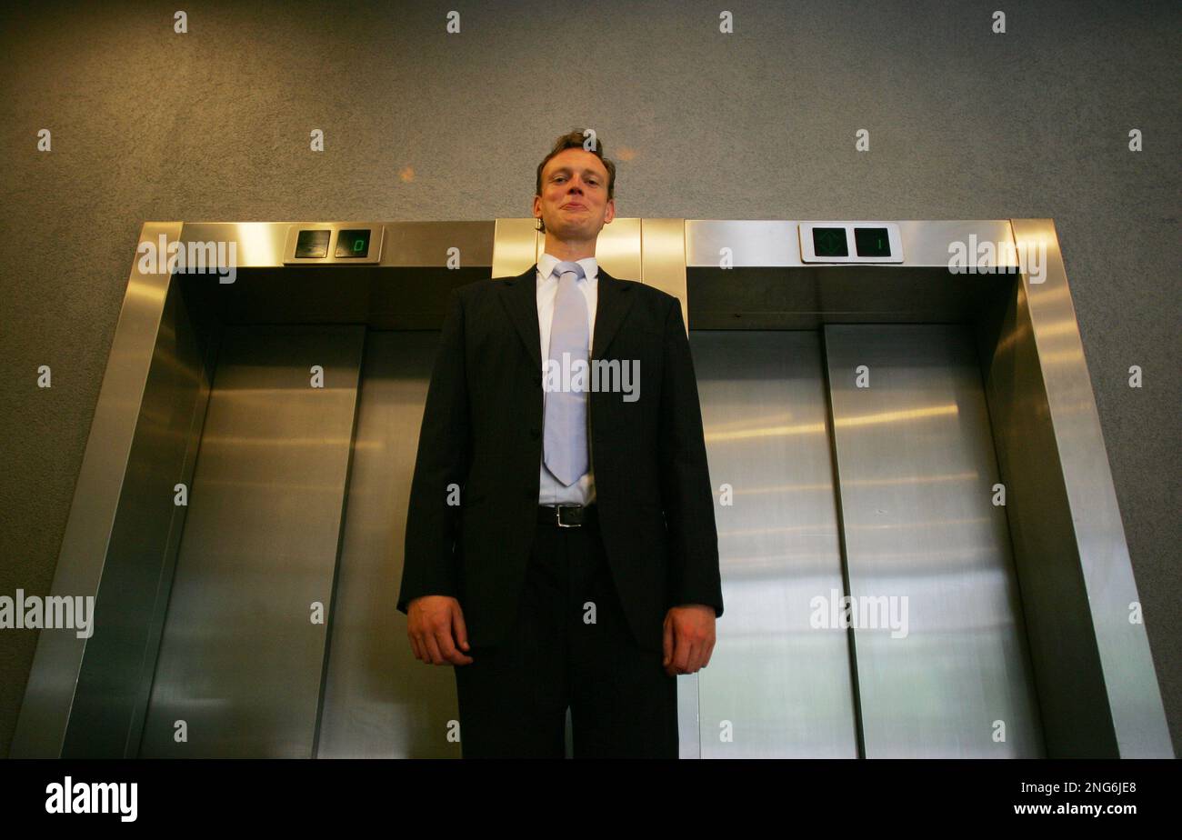 Pieter Gijselaar, 7 feet (210 centimeters) tall, poses for a portrait ...