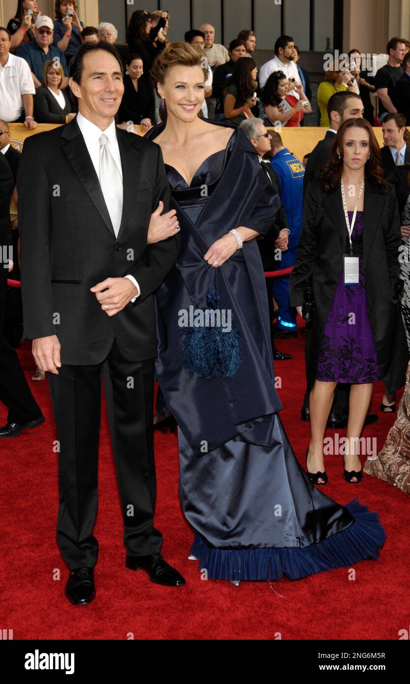 Brenda Strong, right, and her husband Tom Henri arrive at the 13th ...
