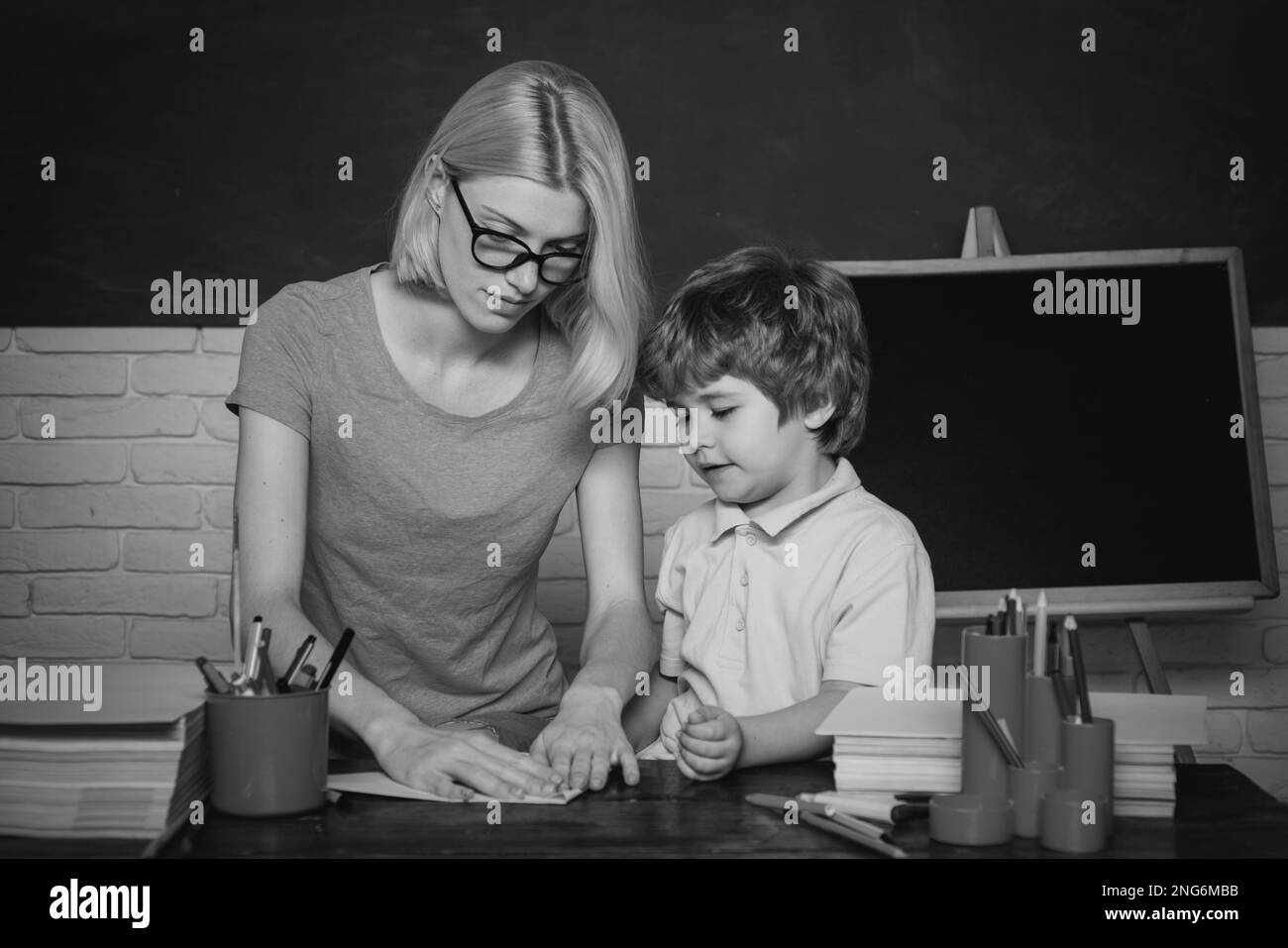 Teacher and kid. Great study achievement. Educational process. School ...