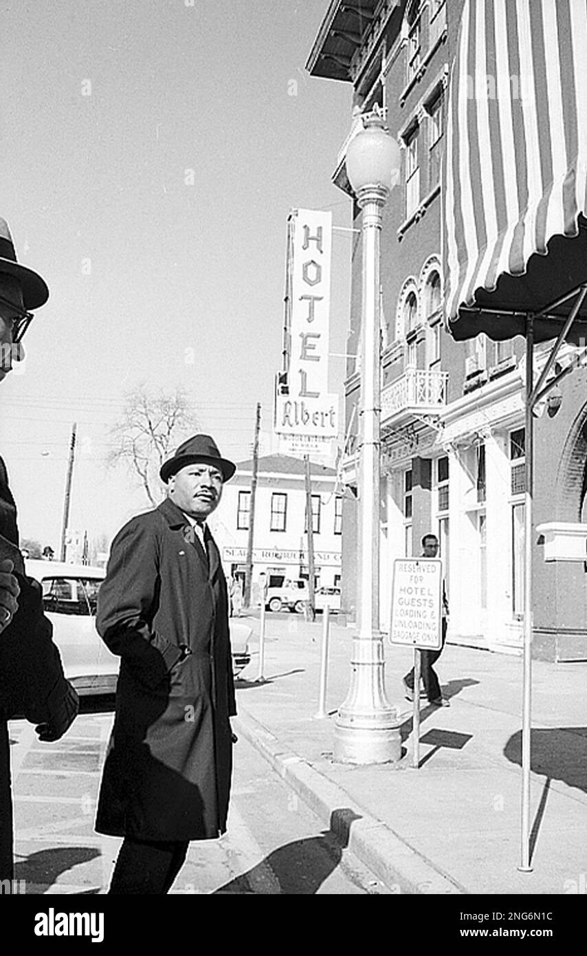 Civil rights leader Dr. Martin Luther King Jr. pauses in front of the ...