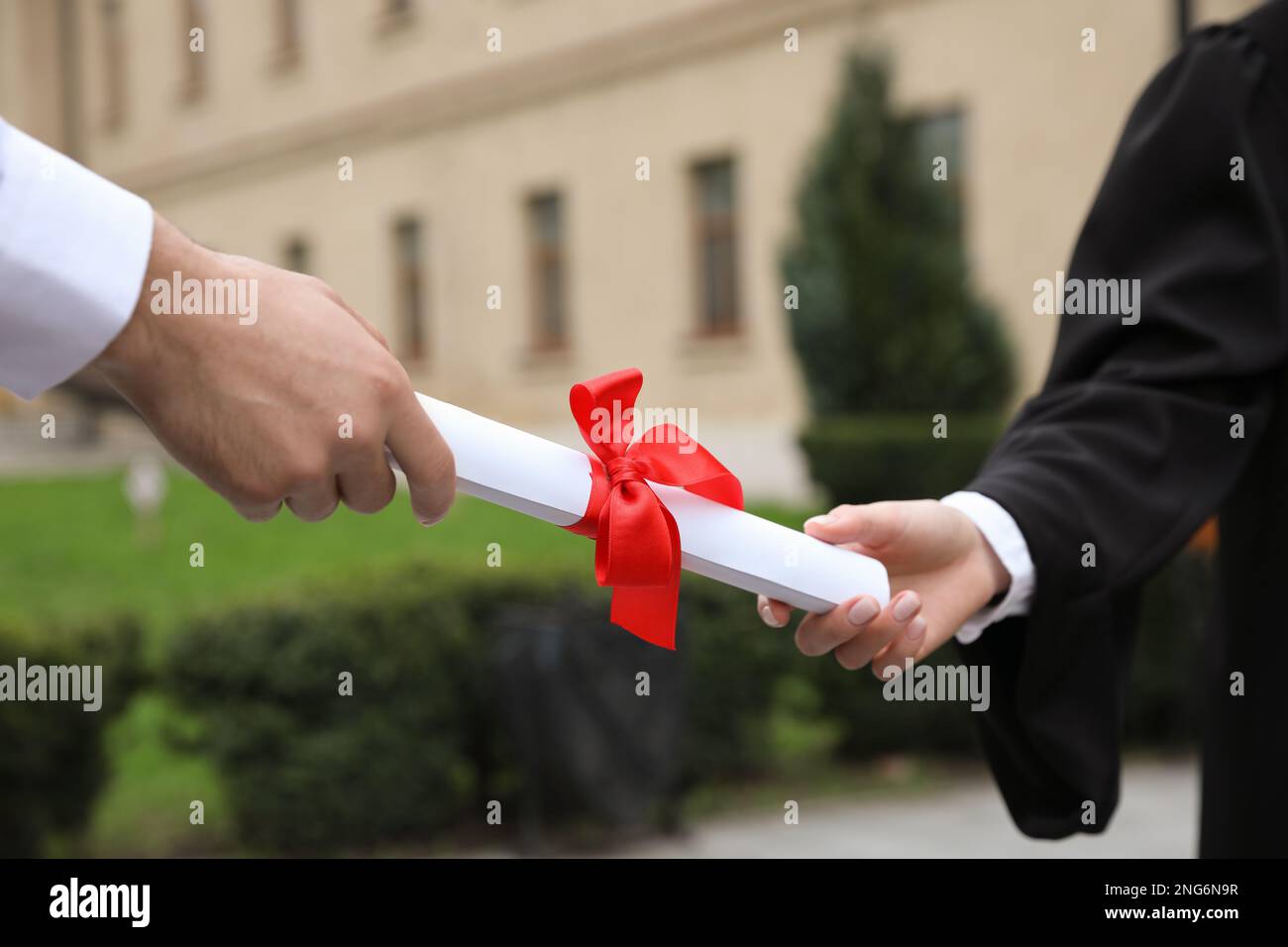 Receiving diploma hi-res stock photography and images - Alamy