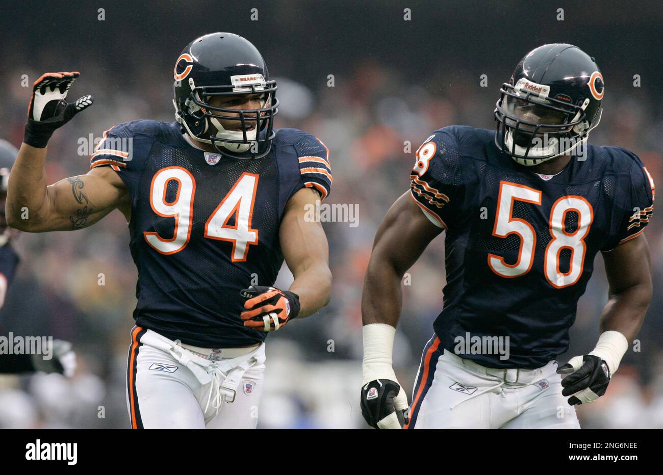 Chicago Bears linebacker Brendon Ayanbadejo (94) and linebacker Darrell ...