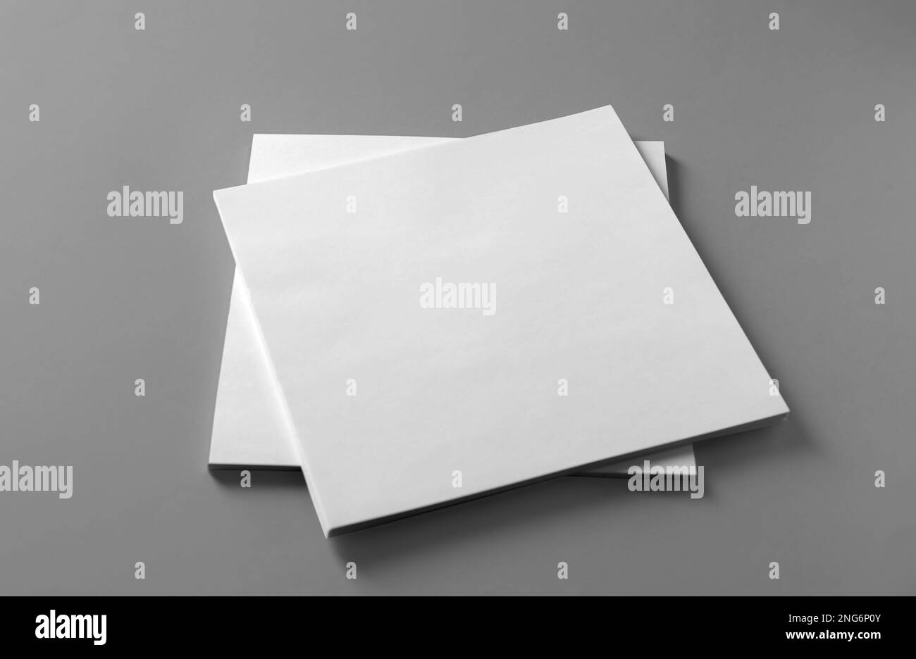 Stack of blank paper sheets for brochure on light grey background Stock ...