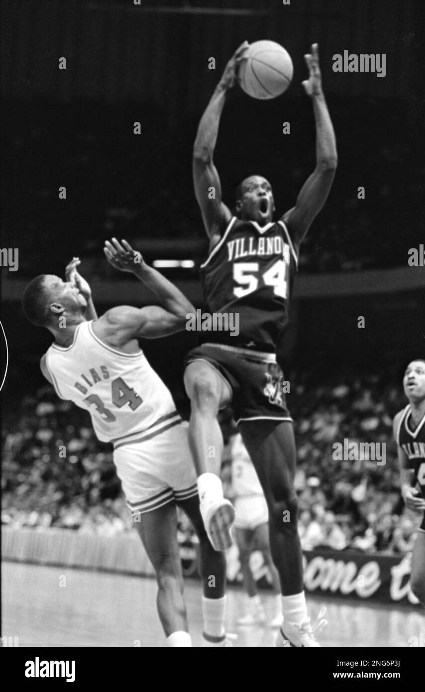Villanova's Ed Pinckney (54) goes up against Maryland's Len Bias (34 ...