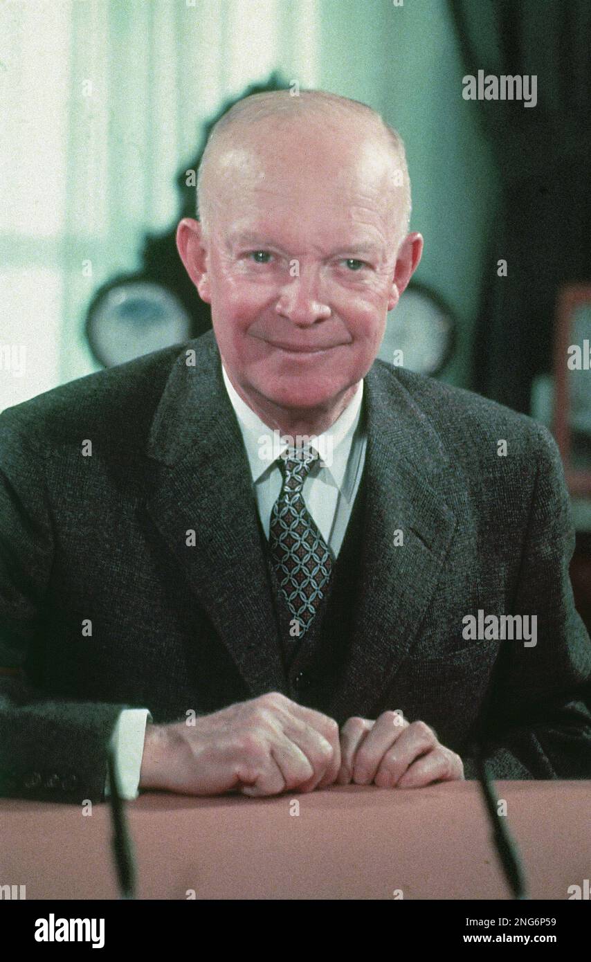 President Dwight Eisenhower is seen at his desk in the White House ...