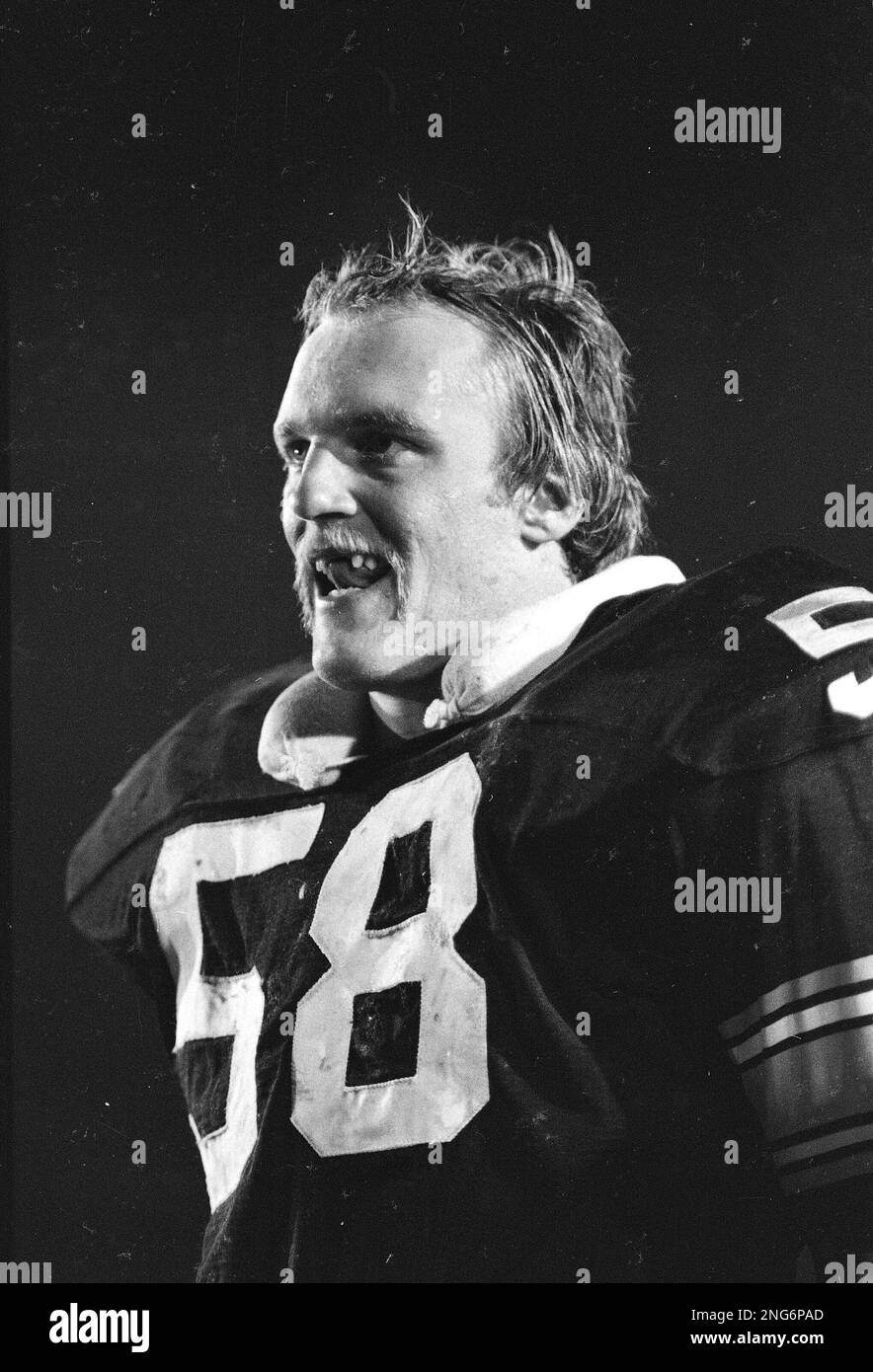 Pittsburgh Steelers linebacker Jack Lambert manages a gap-toothed smile ...
