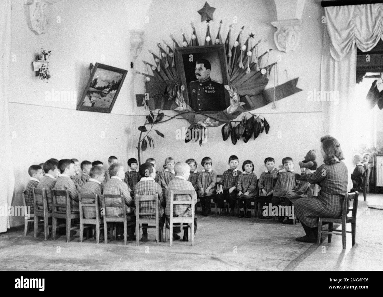 Soviet schoolchildren receive instruction in a nursery school under an ...