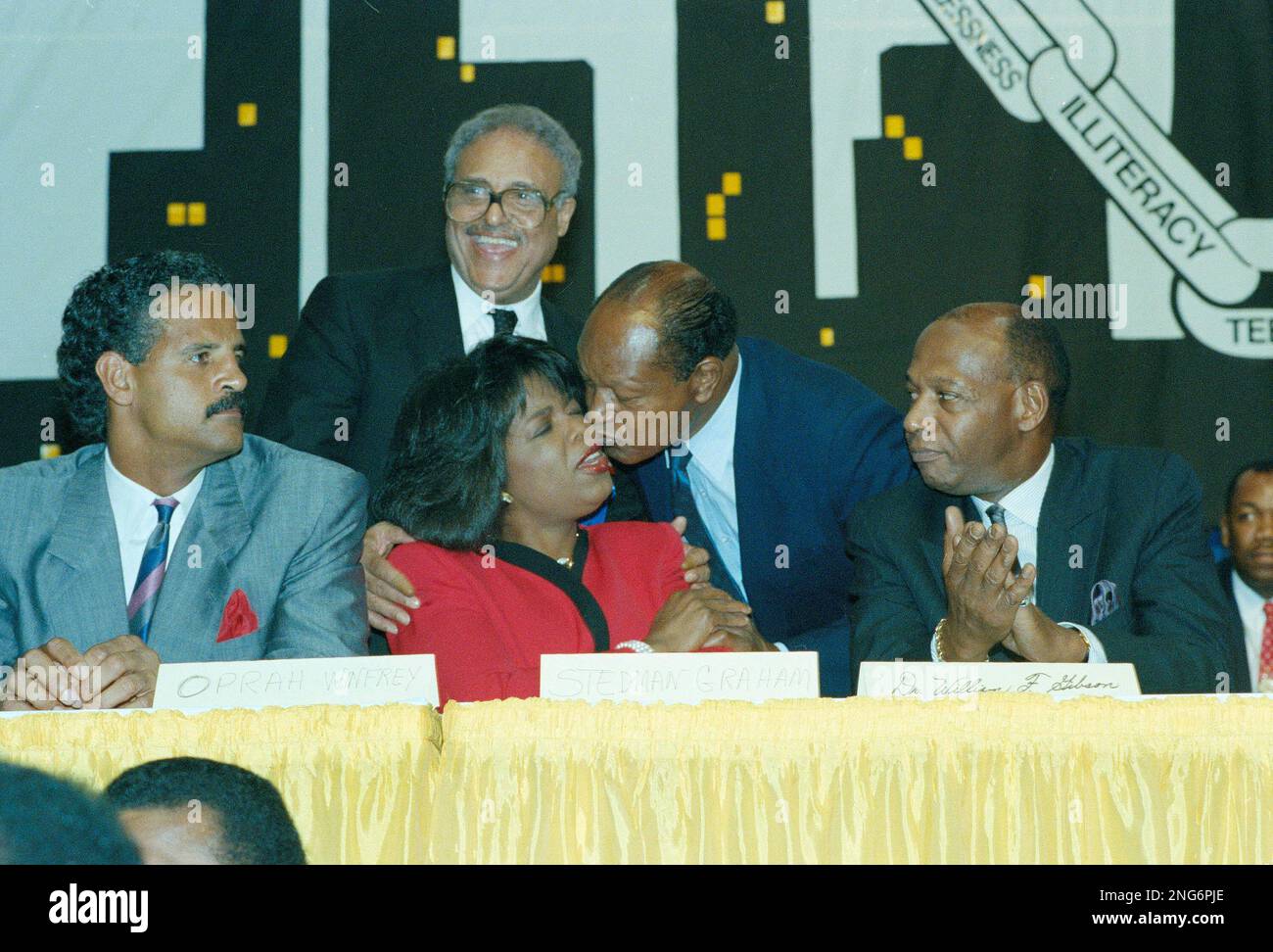 Los Angeles Mayor Tom Bradley plants a kiss on television personality ...