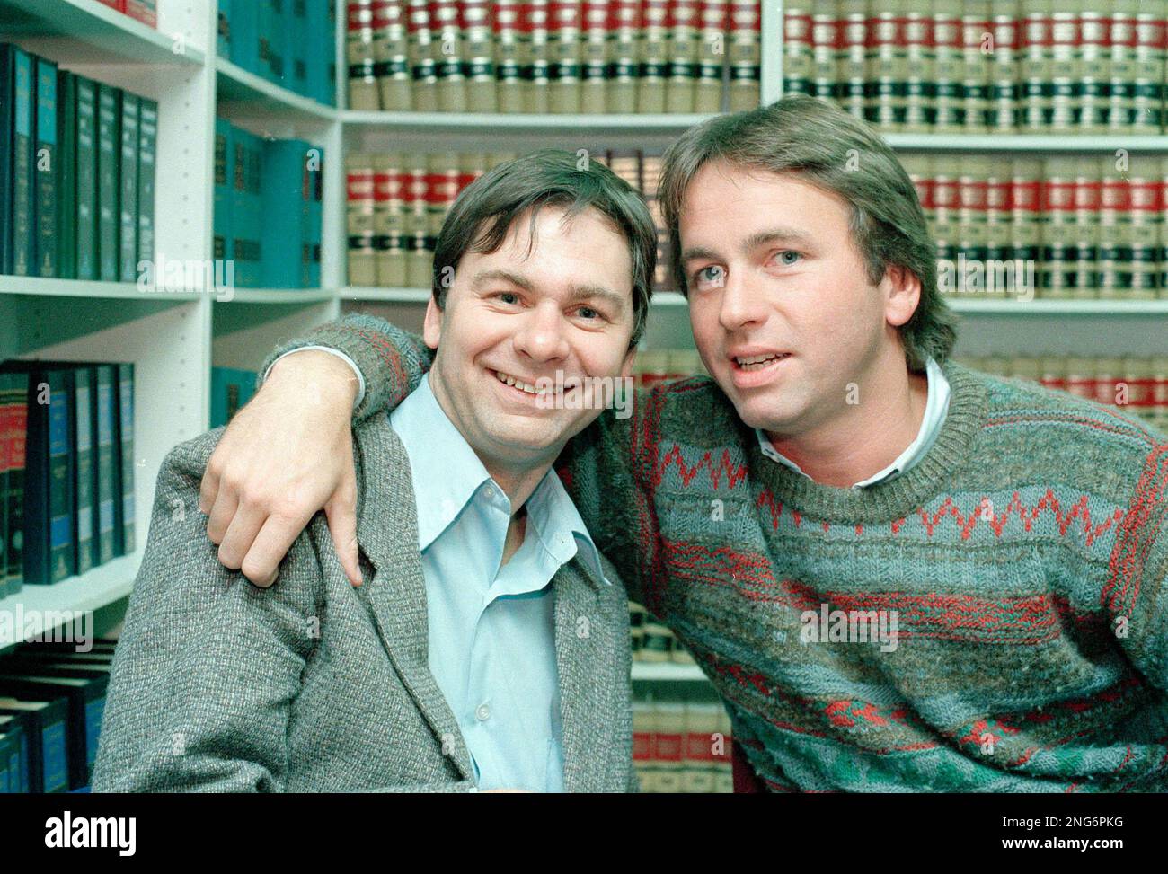 Actor John Ritter, right, gives his bother Tom a hug as they talk about ...