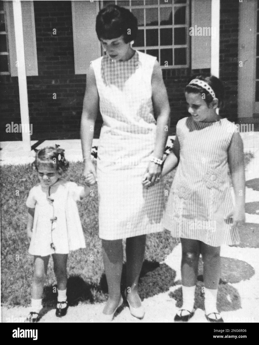 Dr. Carmela Musetto, wife of Dr. Carl Coppolino, is seen with her two ...
