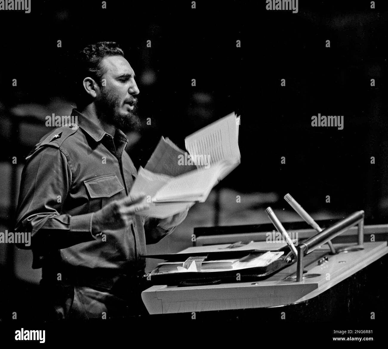 Cuban Premier Fidel Castro waves a document during his talk to the ...