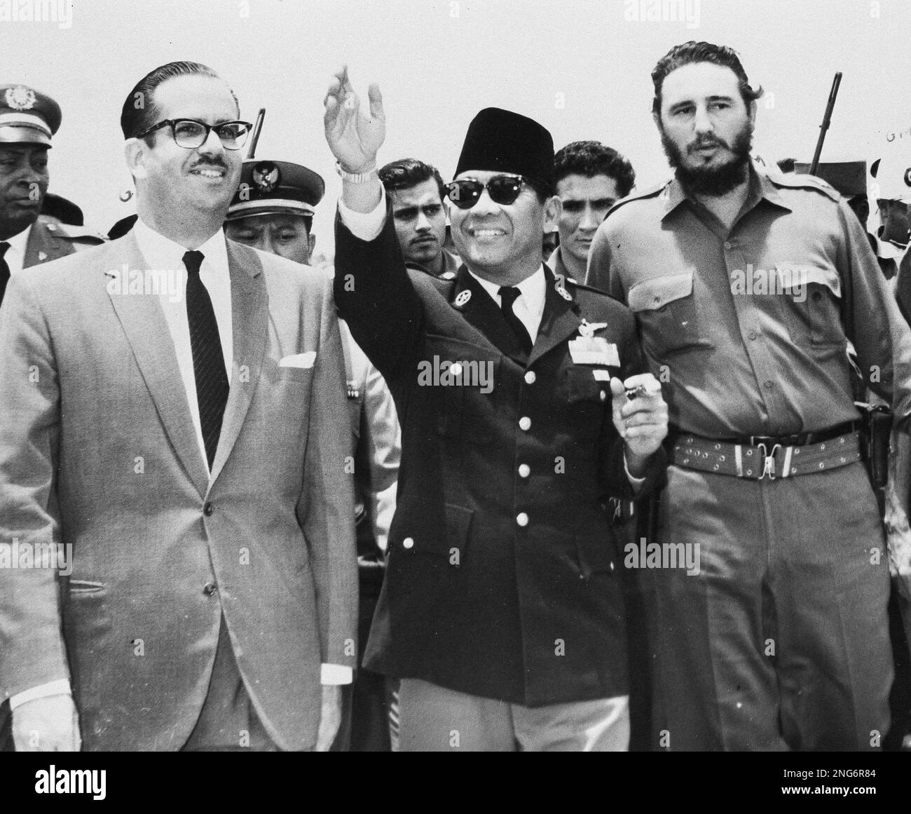 The well-traveled president of Indonesia, Achmed Sukarno, waves to Cuban welcomers after ...